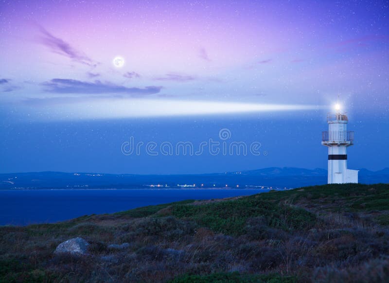 Lighthouse Beaming Light Ray Over Stormy Clouds Stock Image - Image of ...