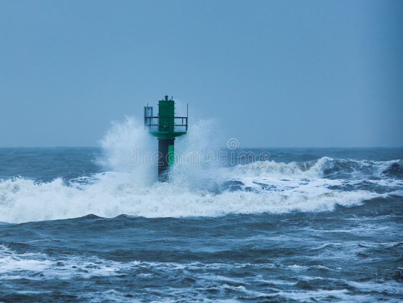 Lighthouse Being Hit by the Waves of the Sea Stock Image - Image of ...