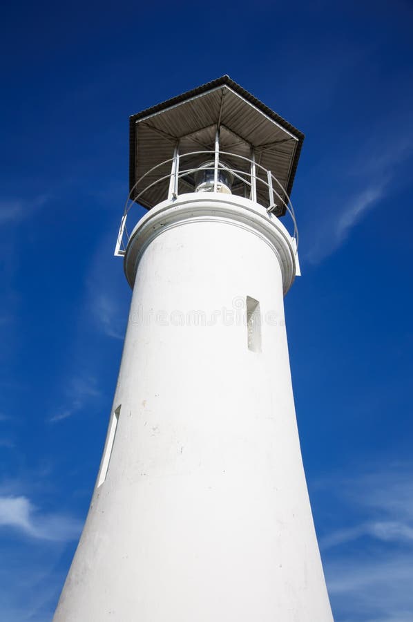 Lighthouse on blue sky stock image. Image of daybreak - 53298255
