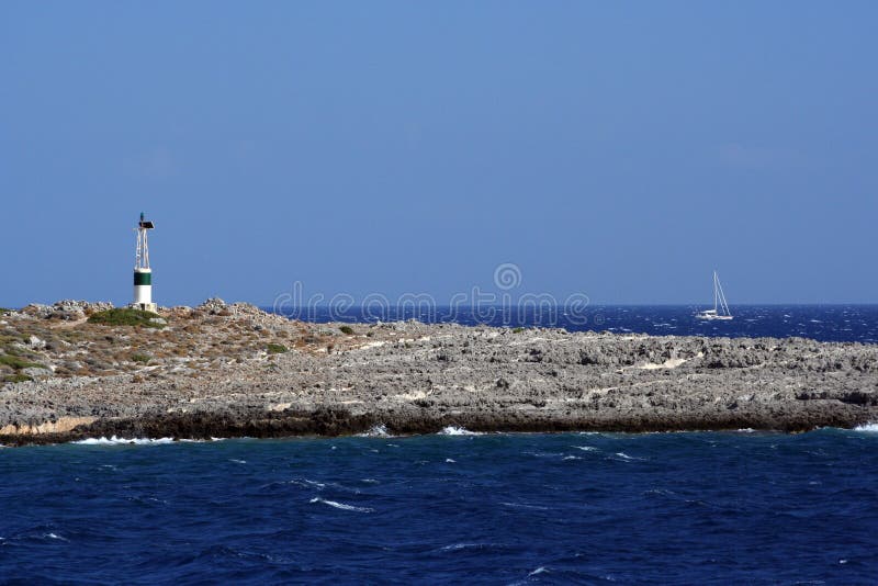 Lighthouse and boat stock image. Image of sail, waves - 3233149