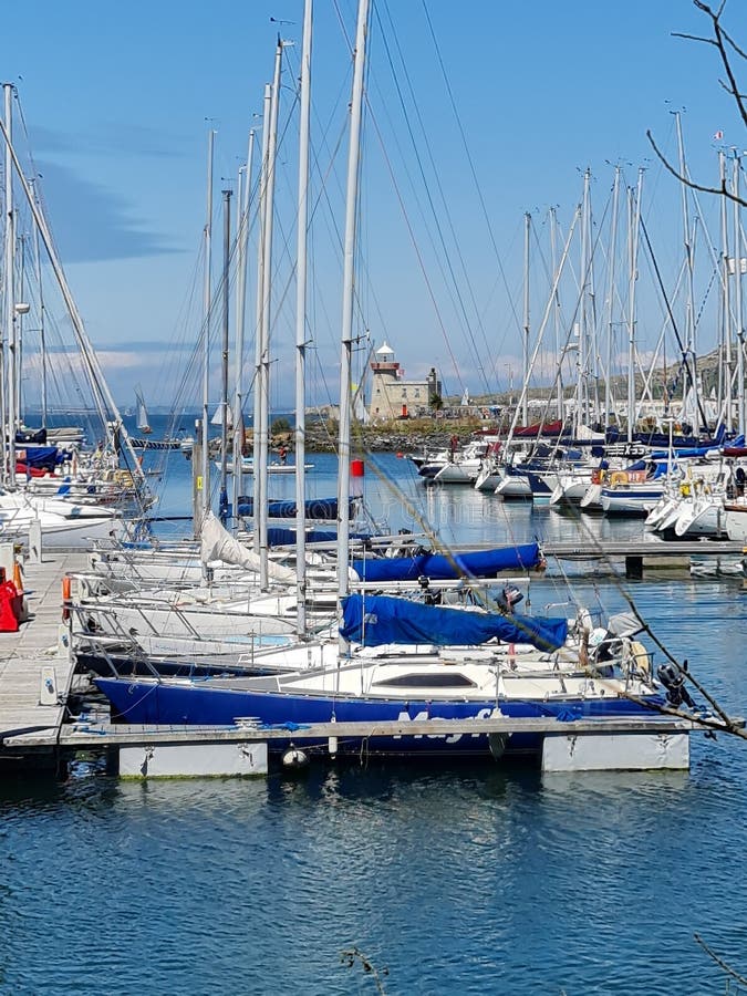 Lighthouse and Boats in Howth, Ireland Editorial Image - Image of yacht ...