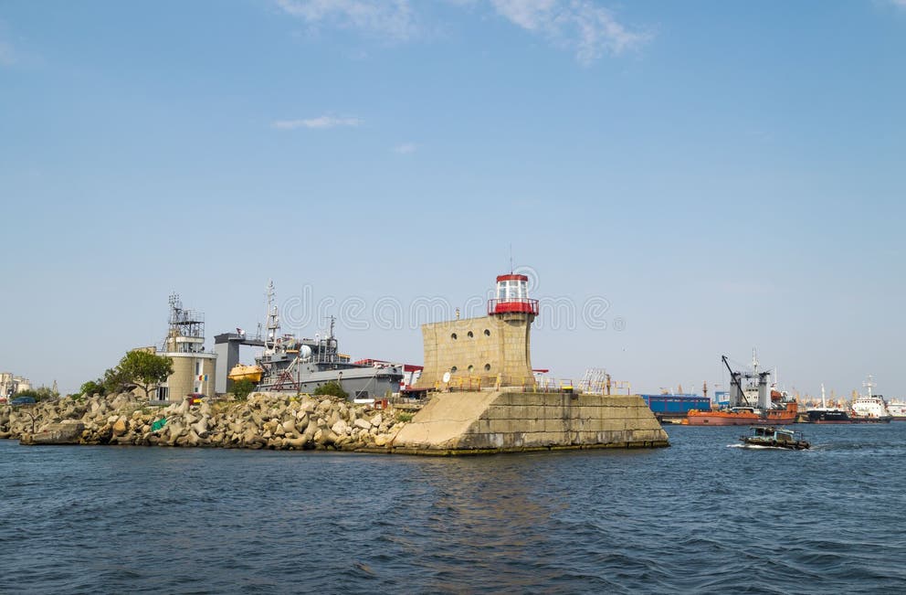 Lighthouse and Breakwaters in Port Constanta Stock Photo - Image of ...