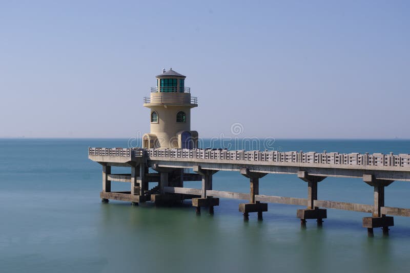 Lighthouse on a pier stock image. Image of outside, nature - 245474661