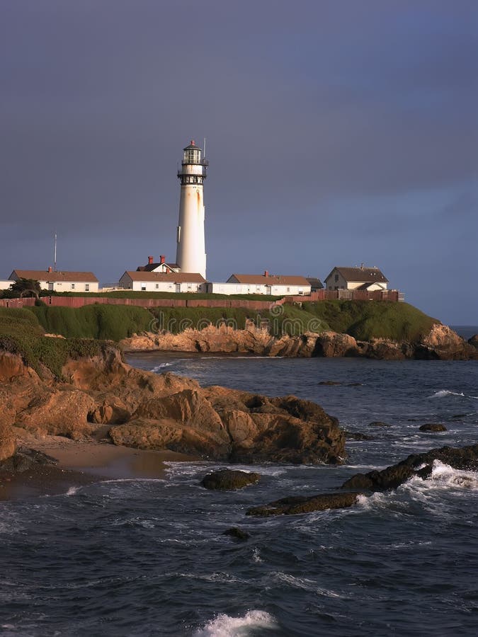Lighthouse with Buildings stock photo. Image of light - 1618602