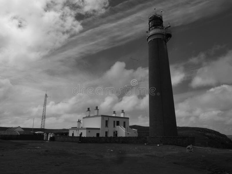 Lighthouse on the of Lewis stock image. Image of families - 242622347