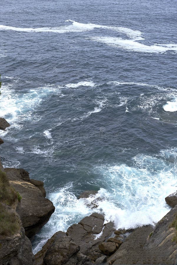 A Lighthouse on the Cantabrian Sea Coast, and Coast Line Stock Photo ...