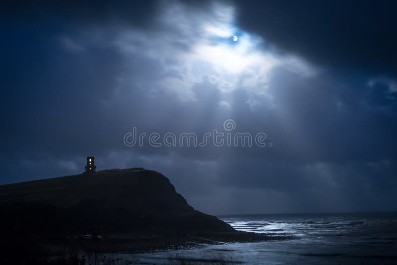 Lighthouse Cliff Moonlight and Clouds in the Sky Stock Image - Image of ...