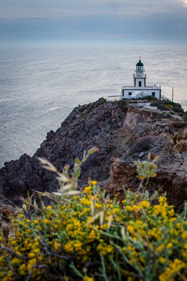 Lighthouse on a cliff stock image. Image of caldera - 186747943