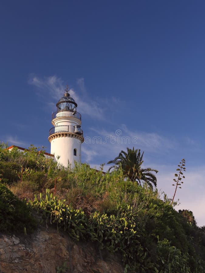 Lighthouse on a cliff stock image. Image of buildings - 44891715