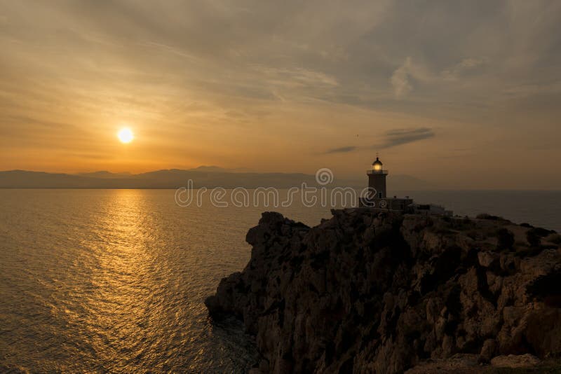Lighthouse on Cliff stock photo. Image of evening, quebec - 1542022