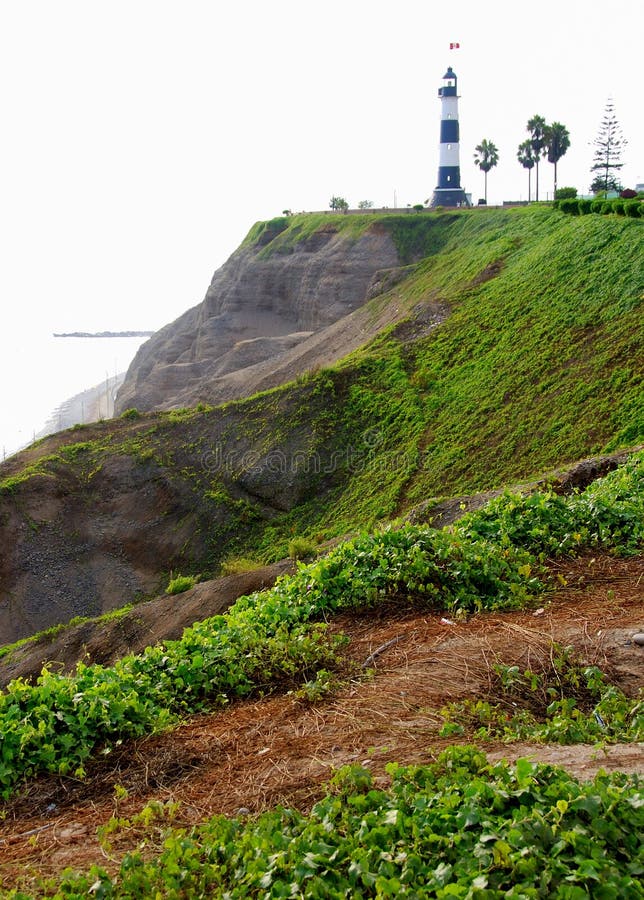 Lighthouse on cliff top stock photo. Image of trees, green - 20264282