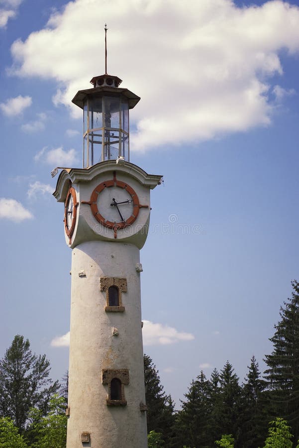 Lighthouse with clock stock image. Image of monument - 12400899