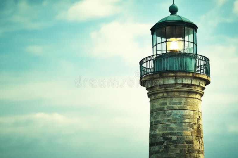 A Lighthouse with a Clock Tower in the Background, Suitable for Use in ...