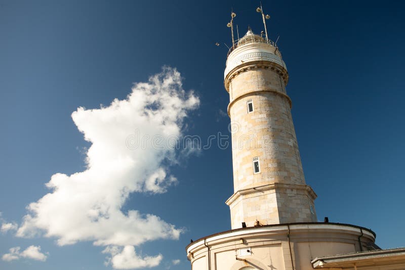 Lighthouse and cloud stock photo. Image of horizontal - 25554546