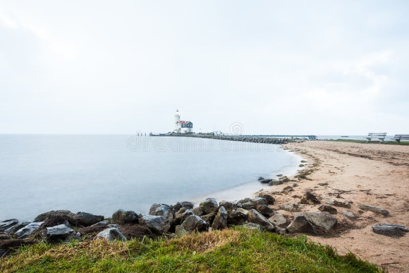 Lighthouse on a cloudy day stock image. Image of beautiful - 102883327