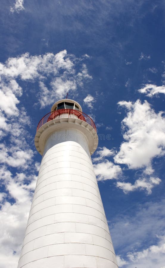 Lighthouse and cloudy sky stock photo. Image of guard - 10735944