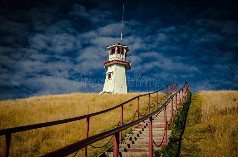 Lighthouse on a Cloudy Sky Background Stock Photo - Image of landscapes ...