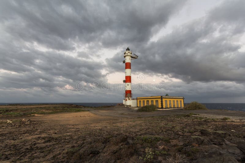 Lighthouse, Cloudy Sky, Evening Stock Image - Image of rescue, weather ...
