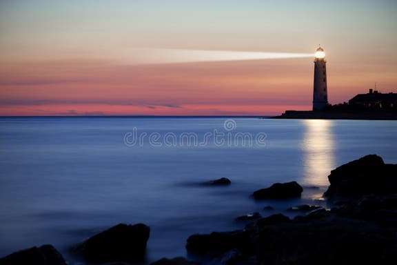 Lighthouse on the coast stock photo. Image of background - 25522066