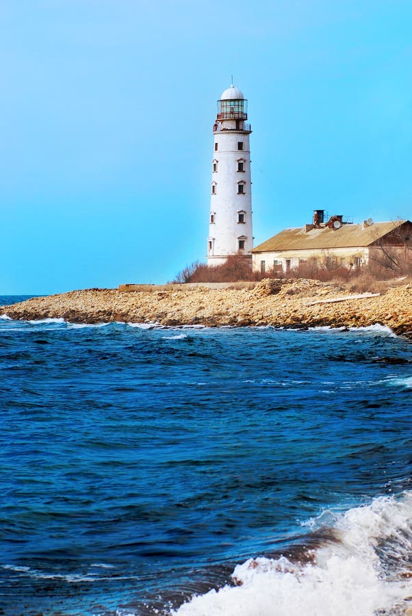 Lighthouse on the coast stock photo. Image of navigation - 27757562