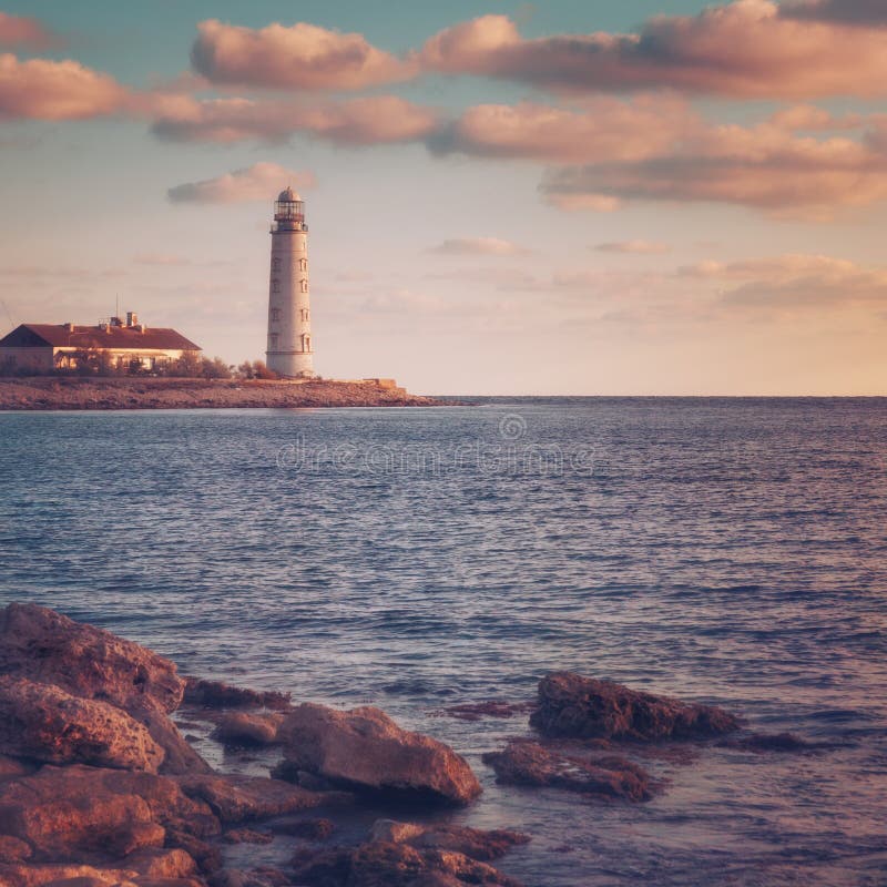 Lighthouse on the coast stock photo. Image of background - 25522066