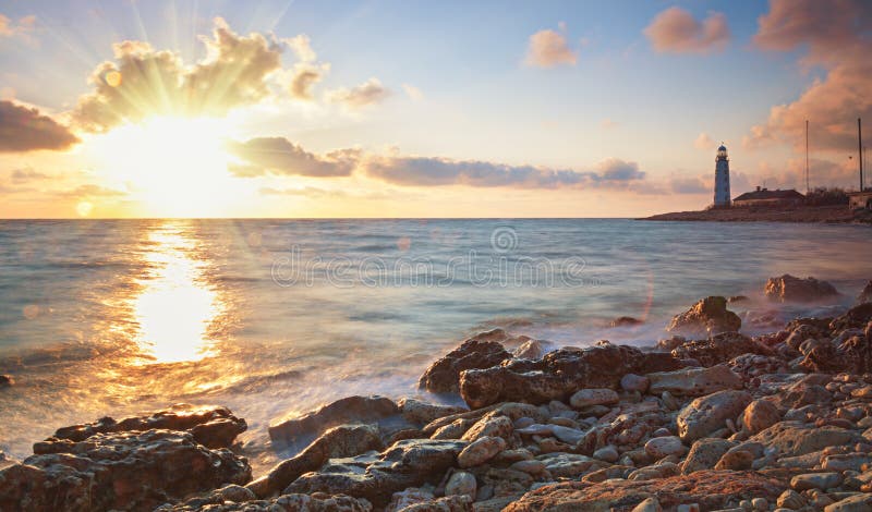 Lighthouse on the coast stock photo. Image of background - 25522066