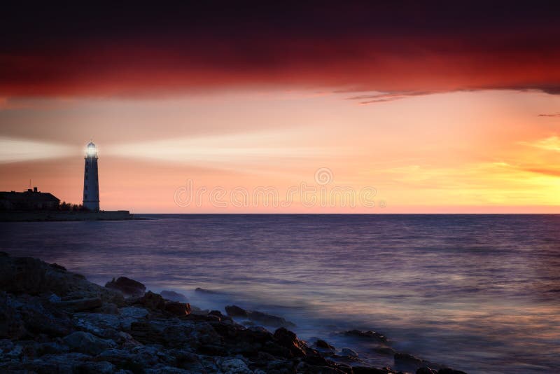 Lighthouse on the coast stock photo. Image of background - 25522066