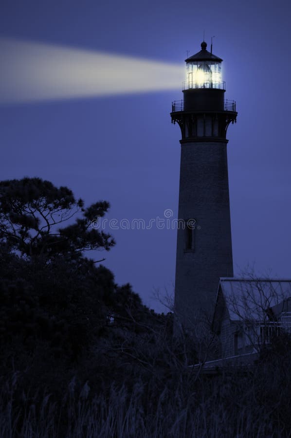Lighthouse after Dark stock photo. Image of flare, core - 84412066