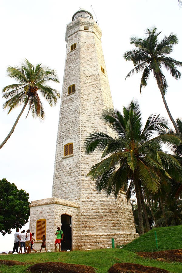 Lighthouse in Dondra and Fishing Boats. Editorial Photo - Image of ...