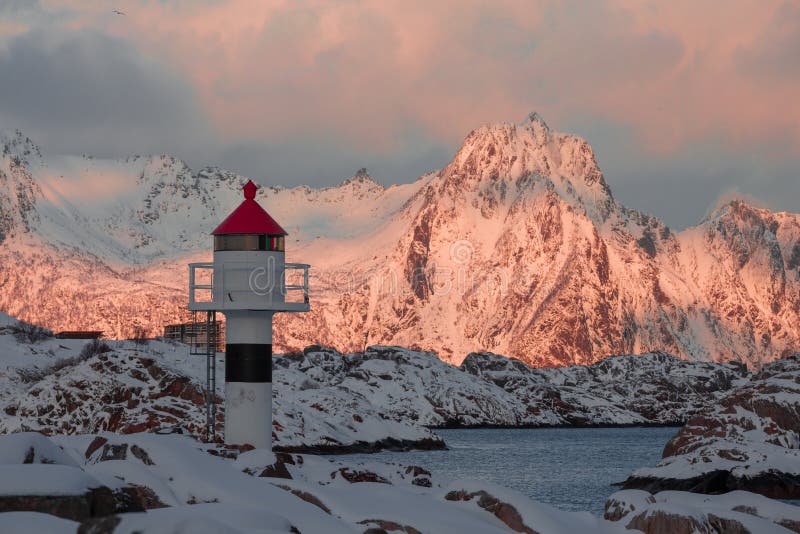 Lighthouse Dueing Winter Sunset in the Mountains of Lofoten Islands ...