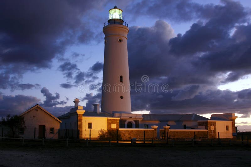 Lighthouse at dusk stock photo. Image of protect, light - 6709332