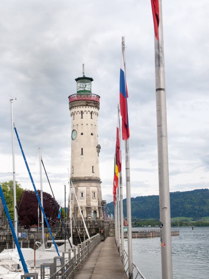 The Lighthouse at the Entrance of Marina Editorial Image - Image of ...