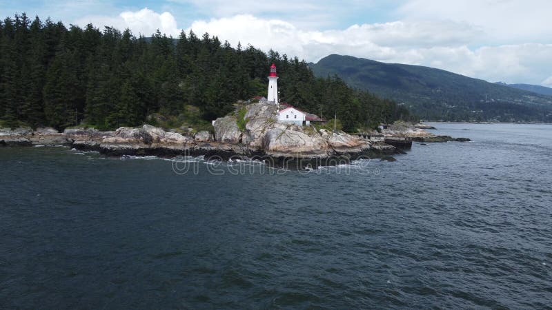 Lighthouse in the Forest Near the Sea Editorial Stock Image - Image of ...