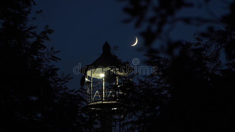 Lighthouse in the Forest at Night with the Moon in the Sky Stock Image ...