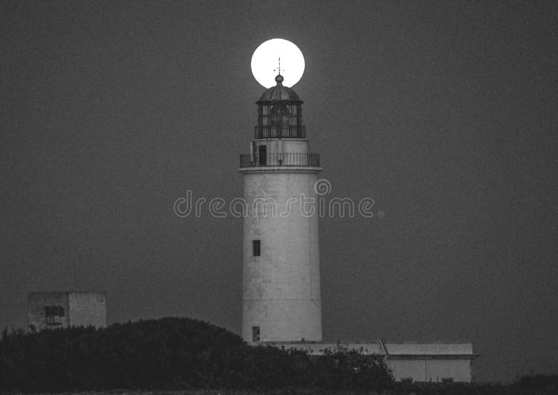 Lighthouse with full moon stock photo. Image of landmark - 254708026