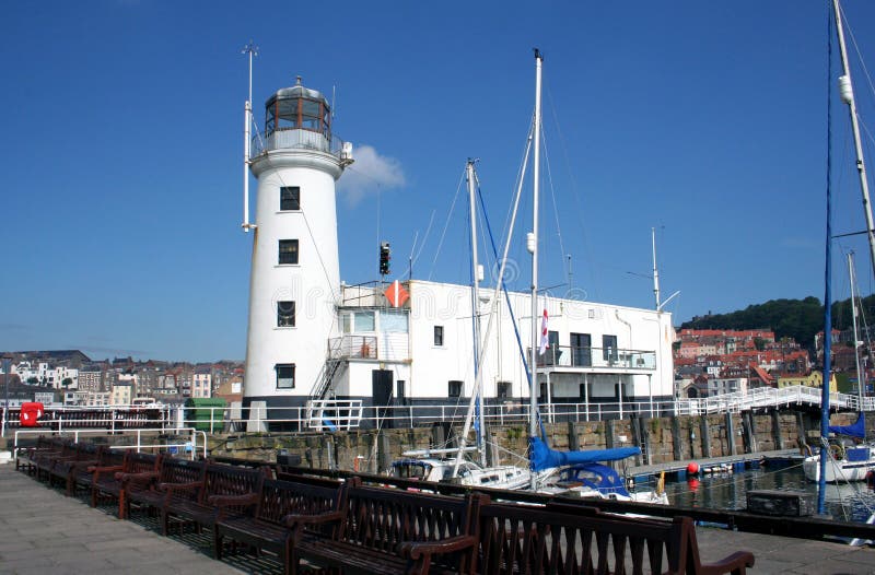 Lighthouse and harbor stock photo. Image of quayside - 11248106