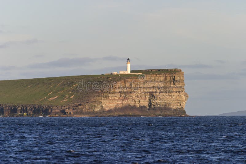 Lighthouse on a High Sea Cliff Stock Image - Image of scene, landscape ...