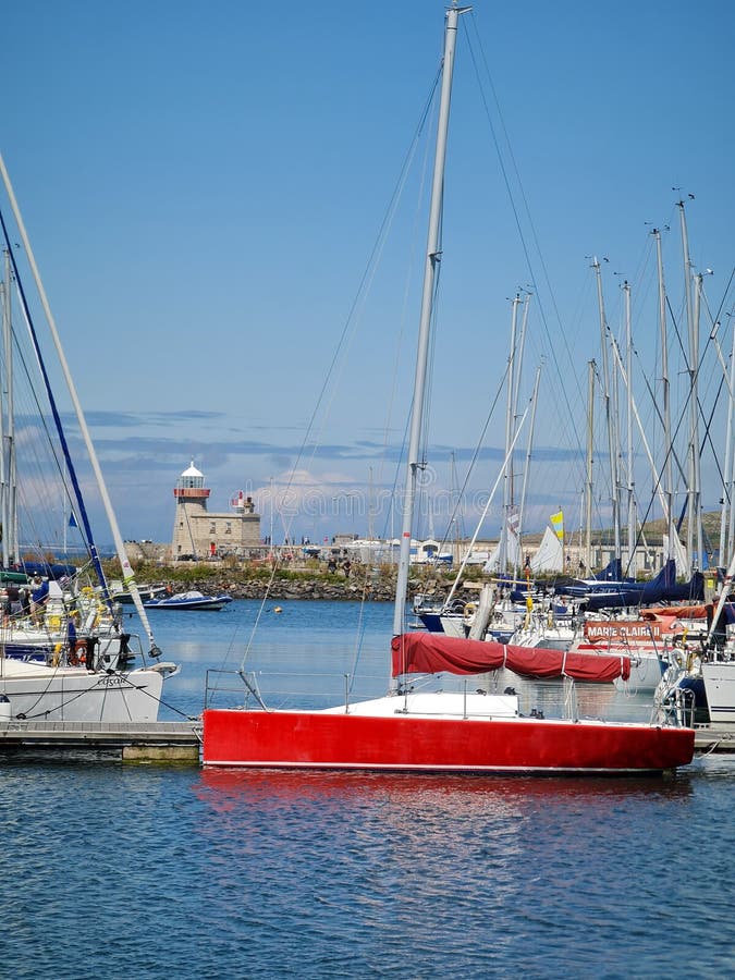 Lighthouse in Howth Harbour, Ireland Editorial Photo - Image of mast ...