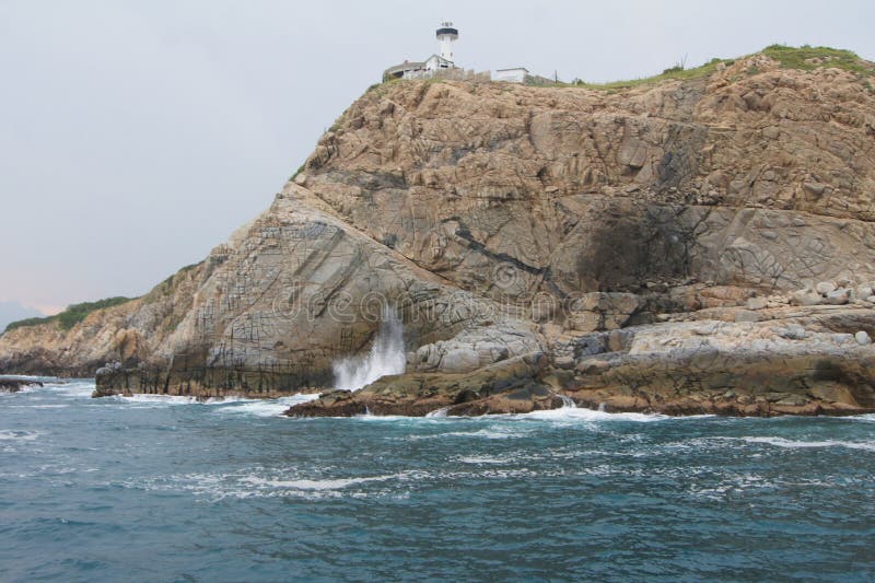 Lighthouse in Huatulco National Park, Mexico Stock Photo - Image of ...