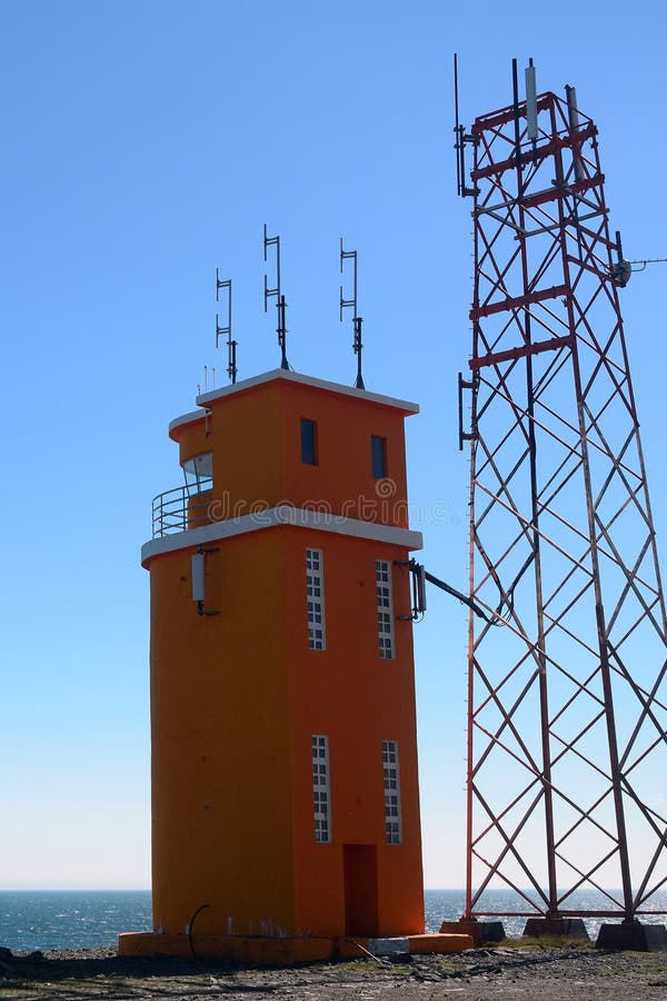 The Lighthouse of Hvalnes in Iceland with Eystrahorn Mountain in the ...