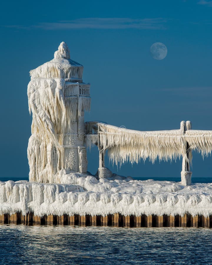St. Joseph North Pier Lighthouse Stock Photo - Image of snow, water ...