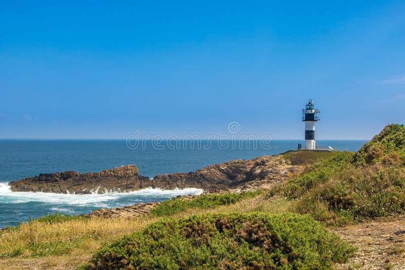 The Lighthouse at Isla Pancha in Galicia Stock Photo - Image of ocean ...