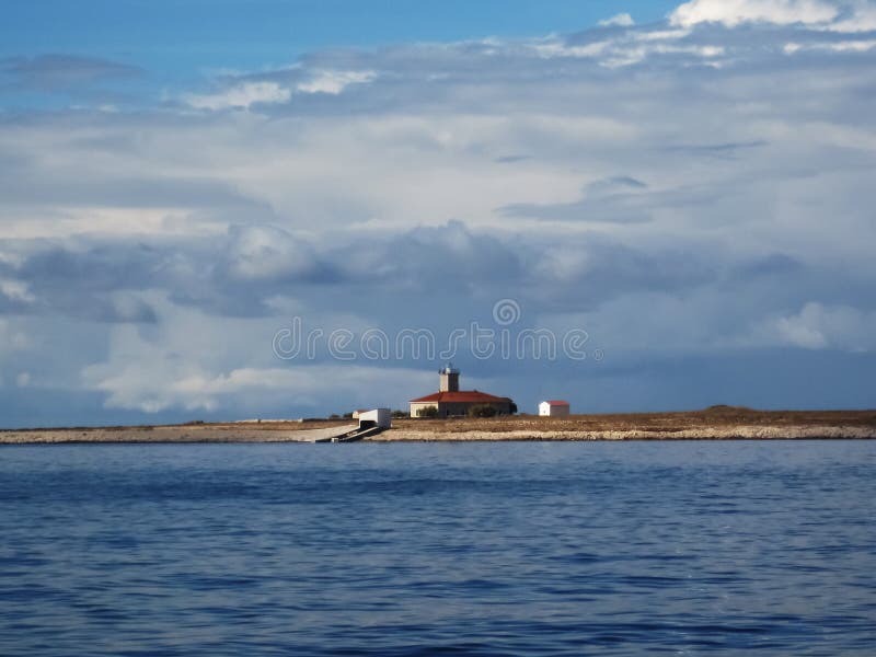 A lighthouse on the island stock image. Image of priory - 103863439