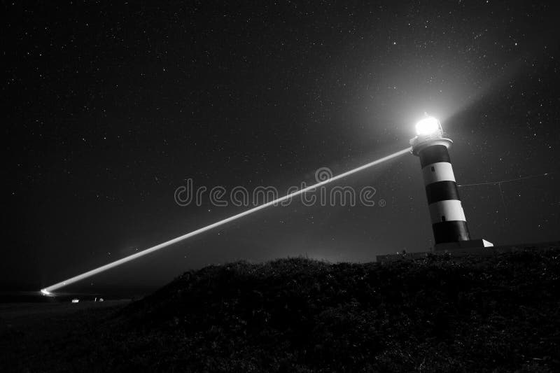 Lighthouse with light ray stock photo. Image of white - 6616222