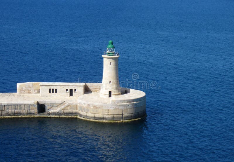 Lighthouse in Malta stock photo. Image of valletta, blue - 55742336
