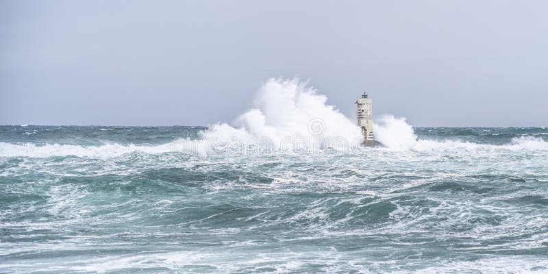 The Lighthouse of the Mangiabarche Shrouded by the Waves of a Mistral ...