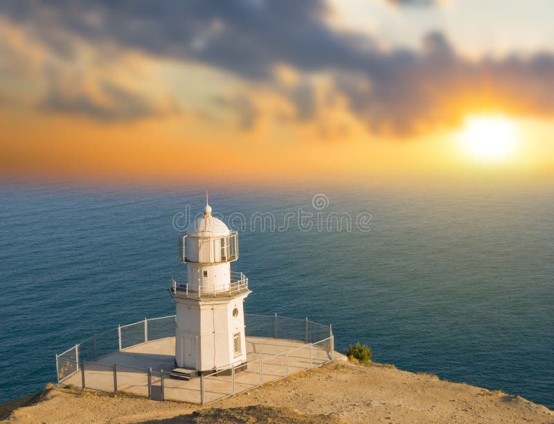 Lighthouse on a Marine Cape Stock Photo - Image of coast, cliff: 174864092
