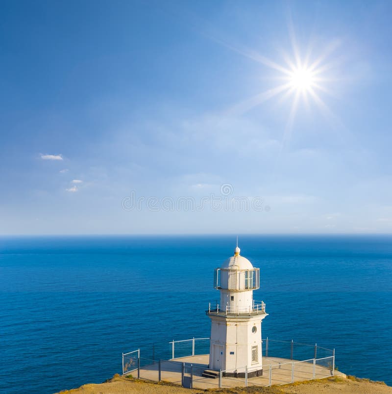 Lighthouse on Marine Cape at Sunny Day Stock Photo - Image of sparkle ...