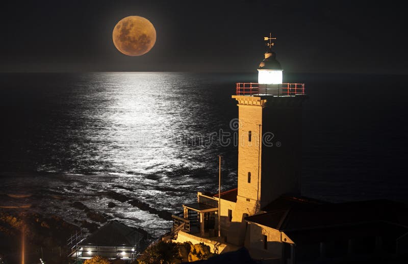 Lighthouse Moon stock photo. Image of mosselbay, moon - 26144966