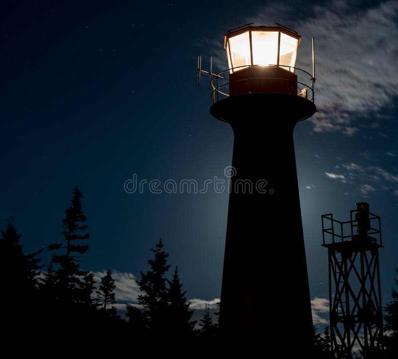 Lighthouse at Night stock image. Image of maritime, moon - 185795943